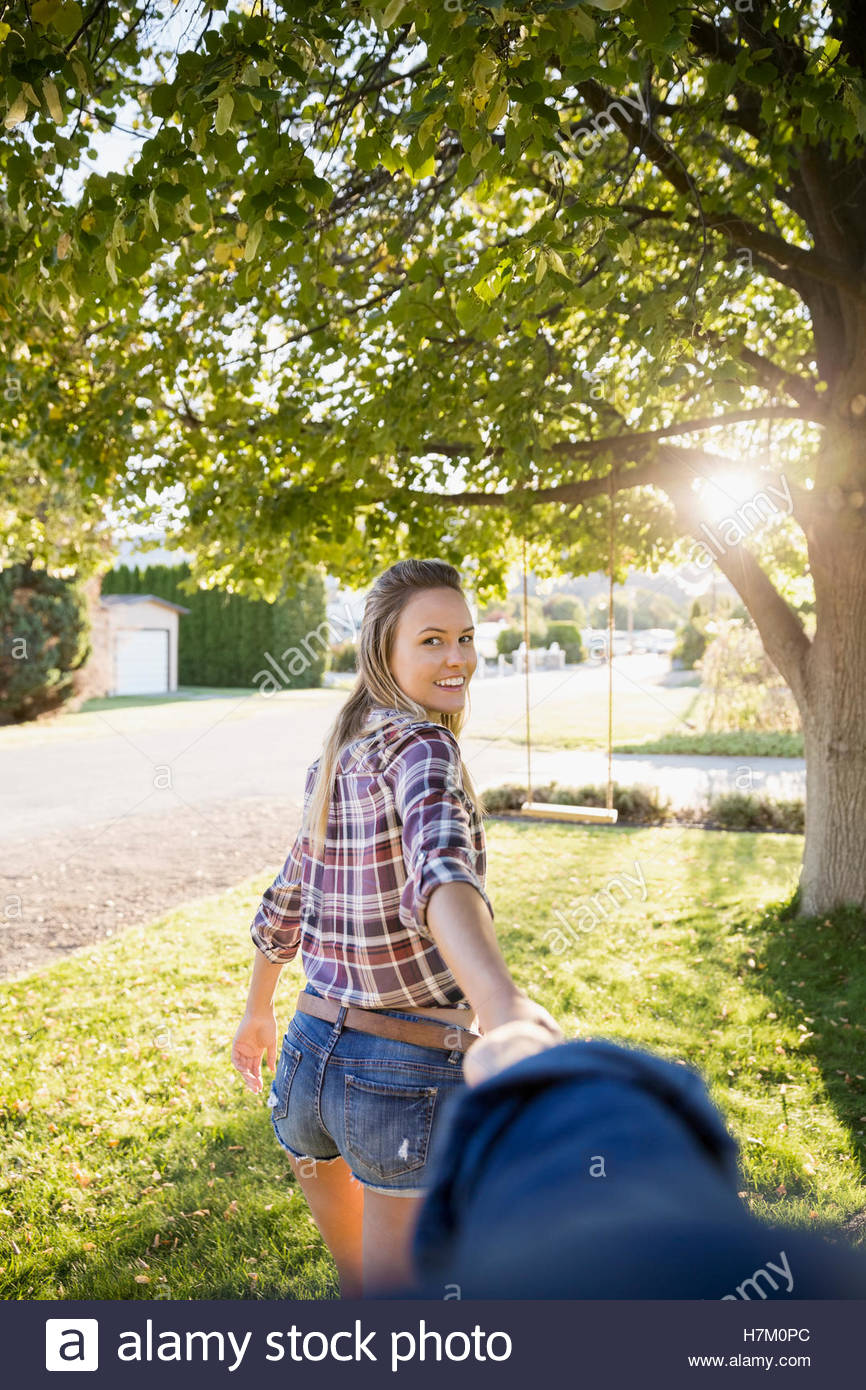Man pulling his wife hi-res stock photography and images - Alamy