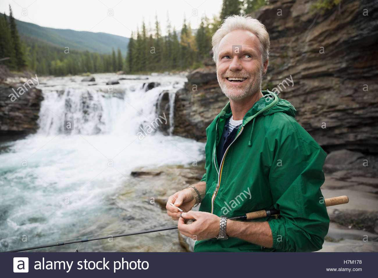 Man at waterfall hi-res stock photography and images - Alamy