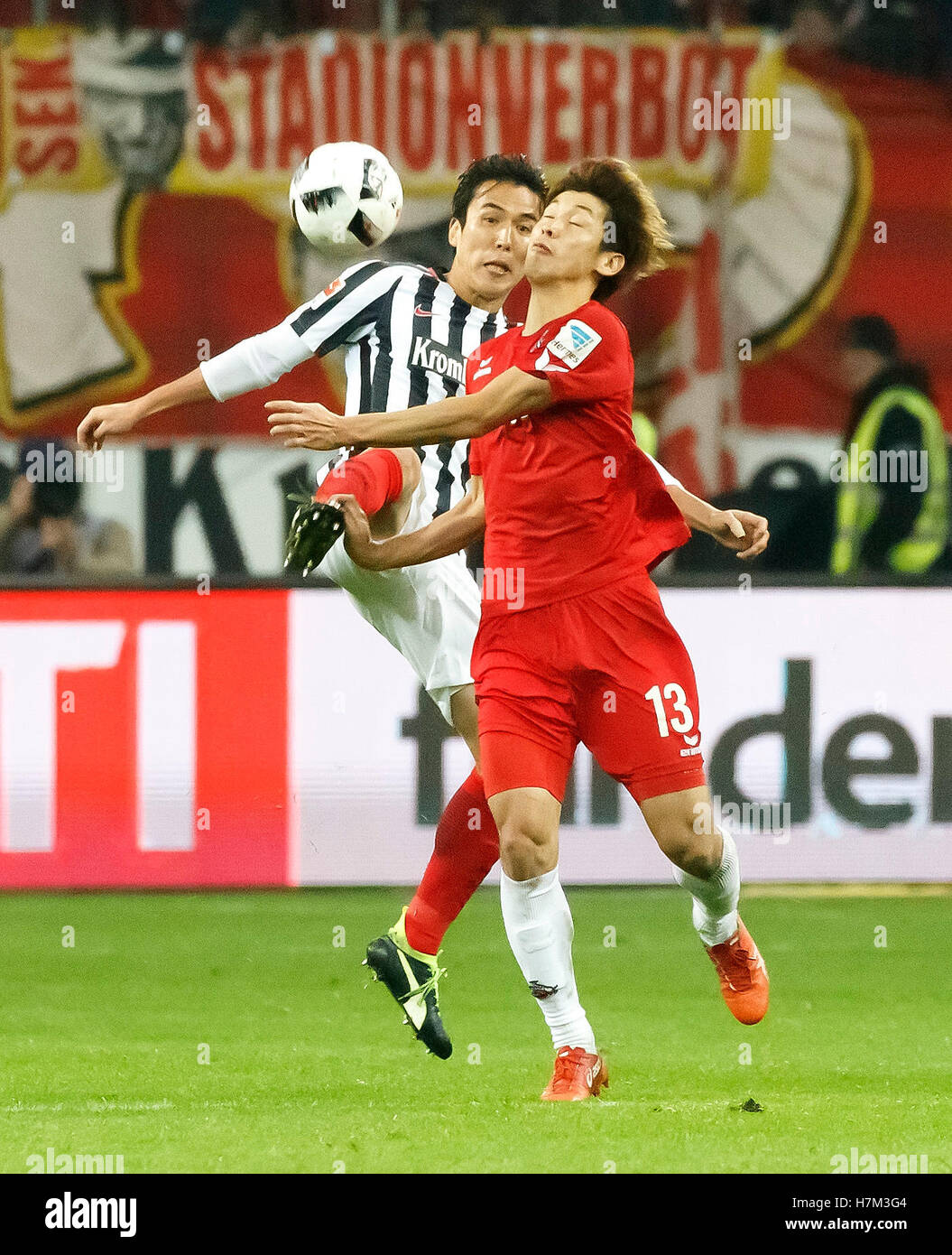 Frankfurt's Makoto Hasebe (r) and Cologne's Yua Osaka in action during ...