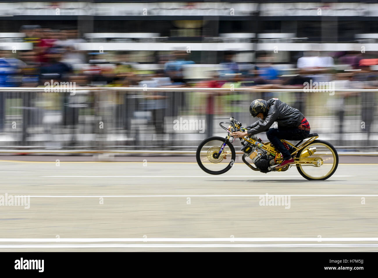 Kuala Lumpur, MALAYSIA. 6th Nov, 2016. The front wheel lifts off the ...