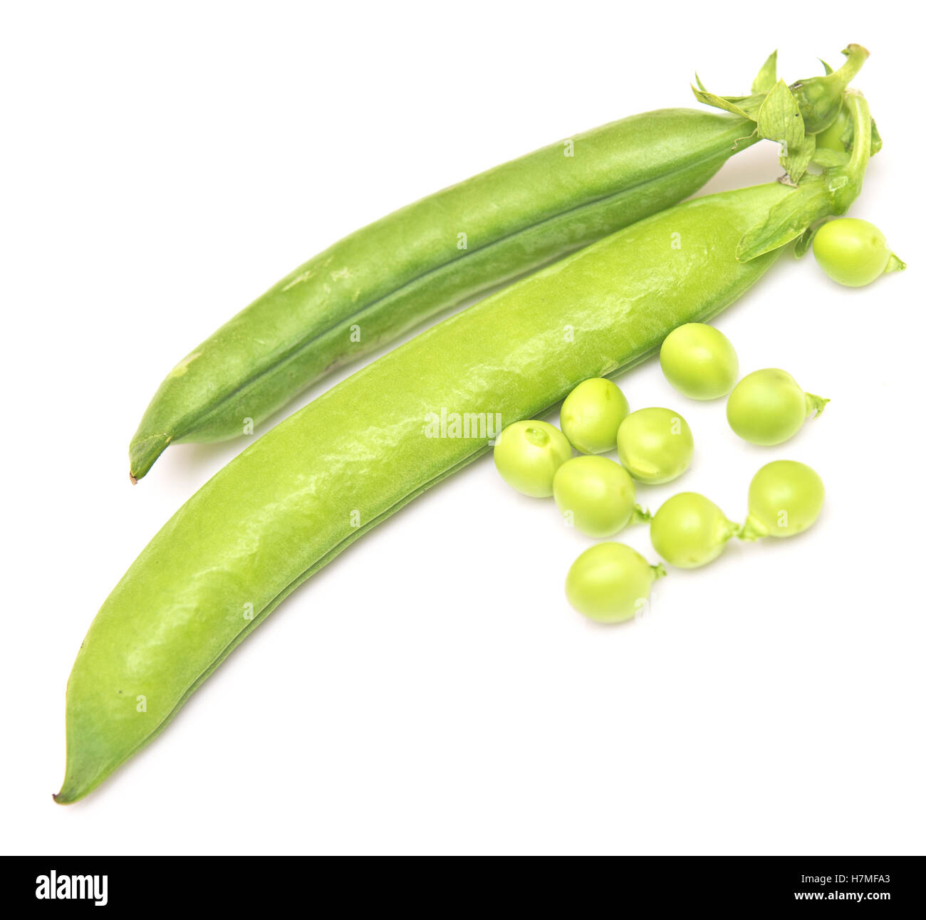 green peas isolated on white background Stock Photo - Alamy