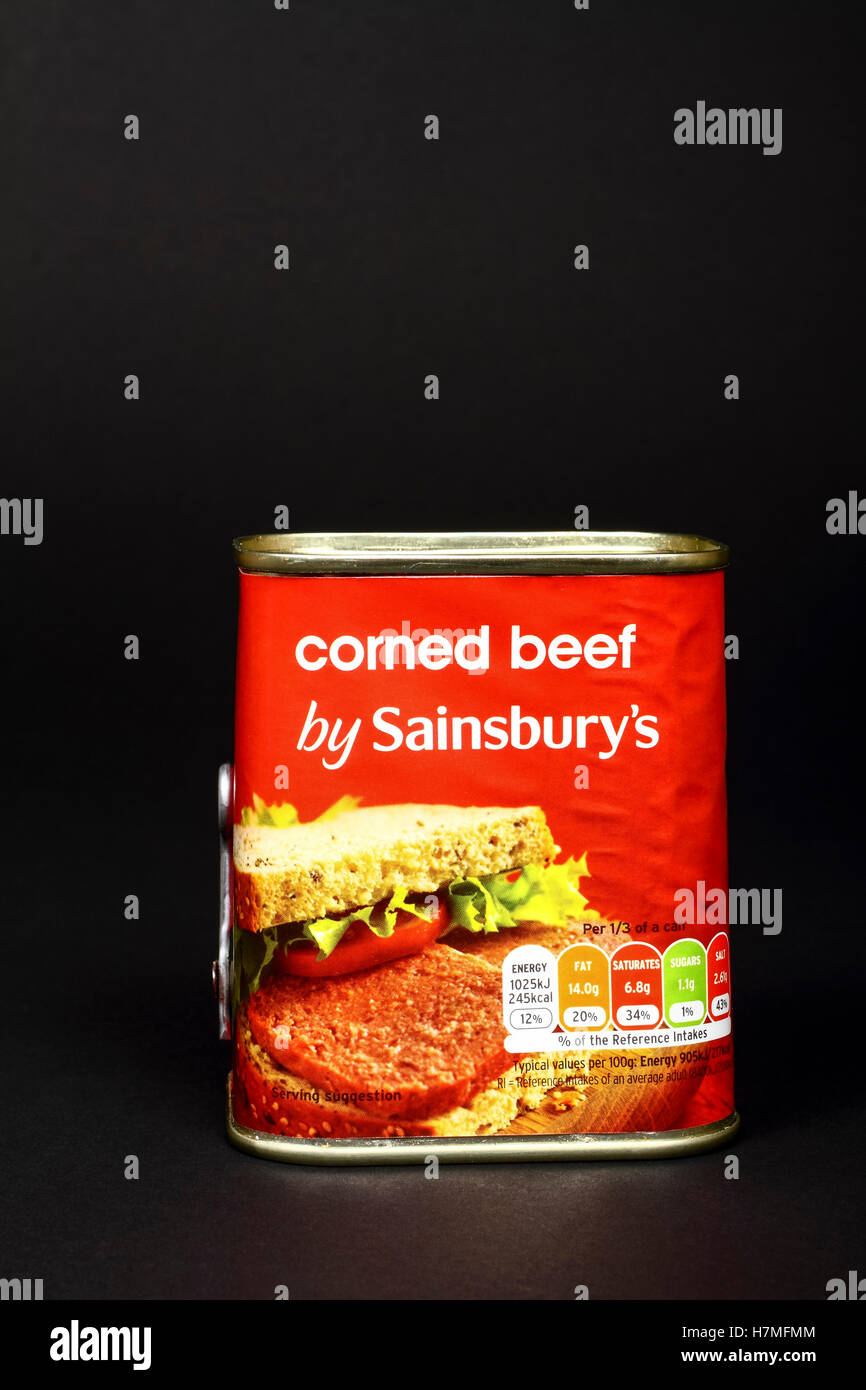 Sainsburys own label tinned corned beef isolated on a black background ...