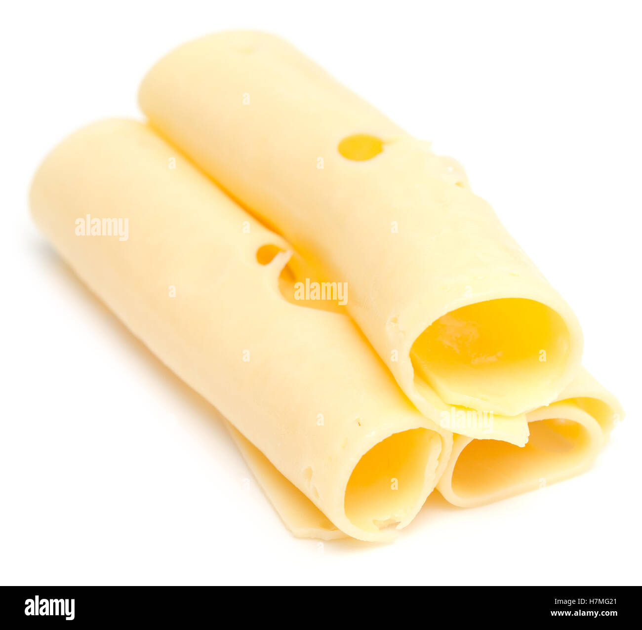 sliced cheese isolated on white background Stock Photo - Alamy