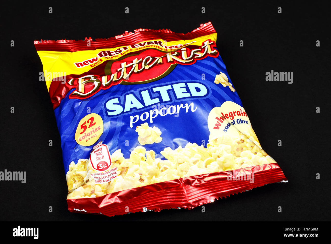 Butterkist popcorn packet isolated on a black background Stock Photo ...