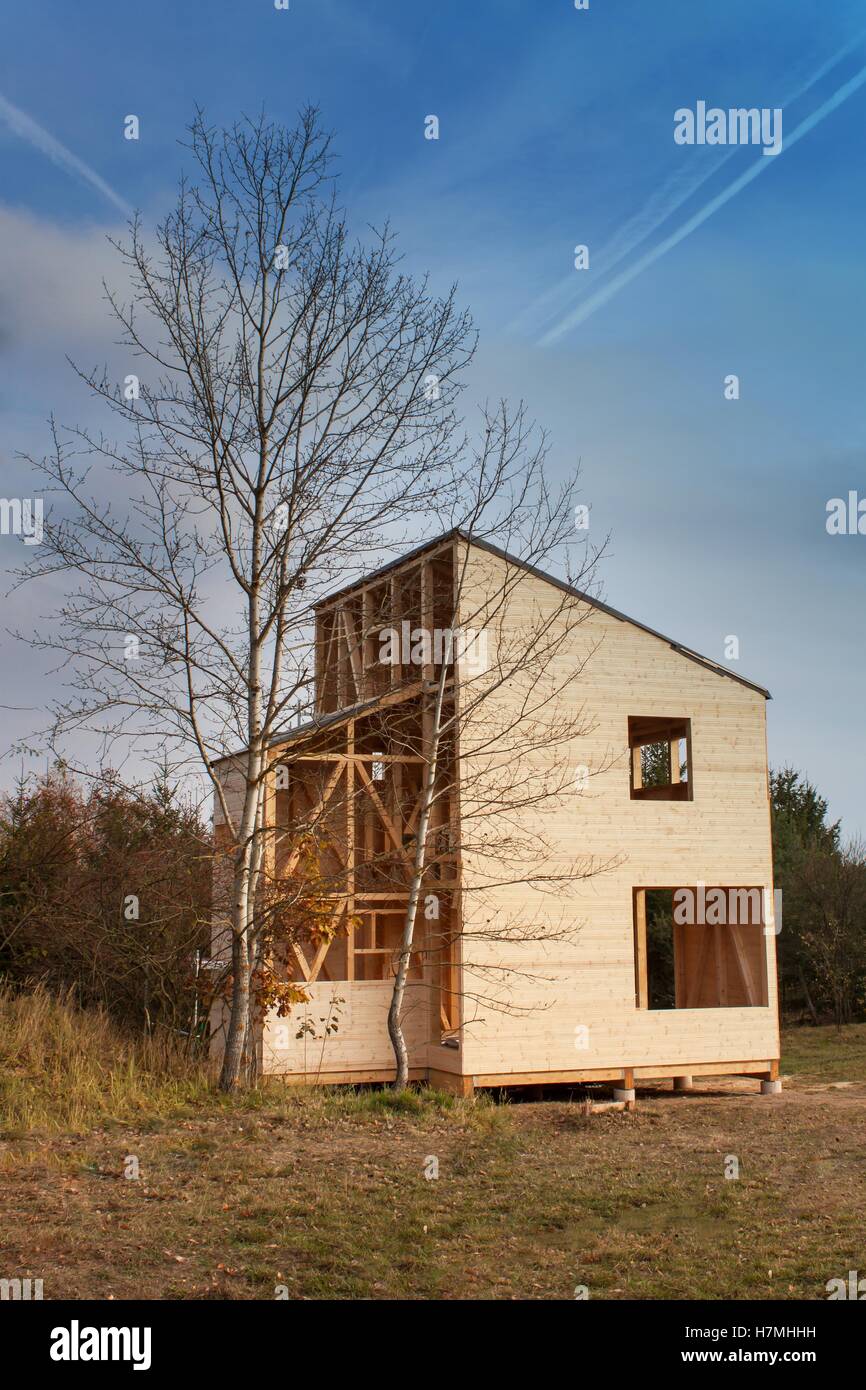 Empty building site ecological house. External work on the building ...