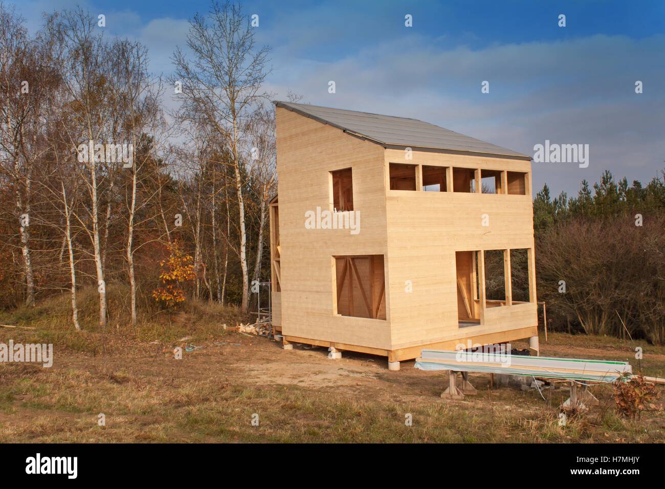 Empty building site ecological house. External work on the building ...