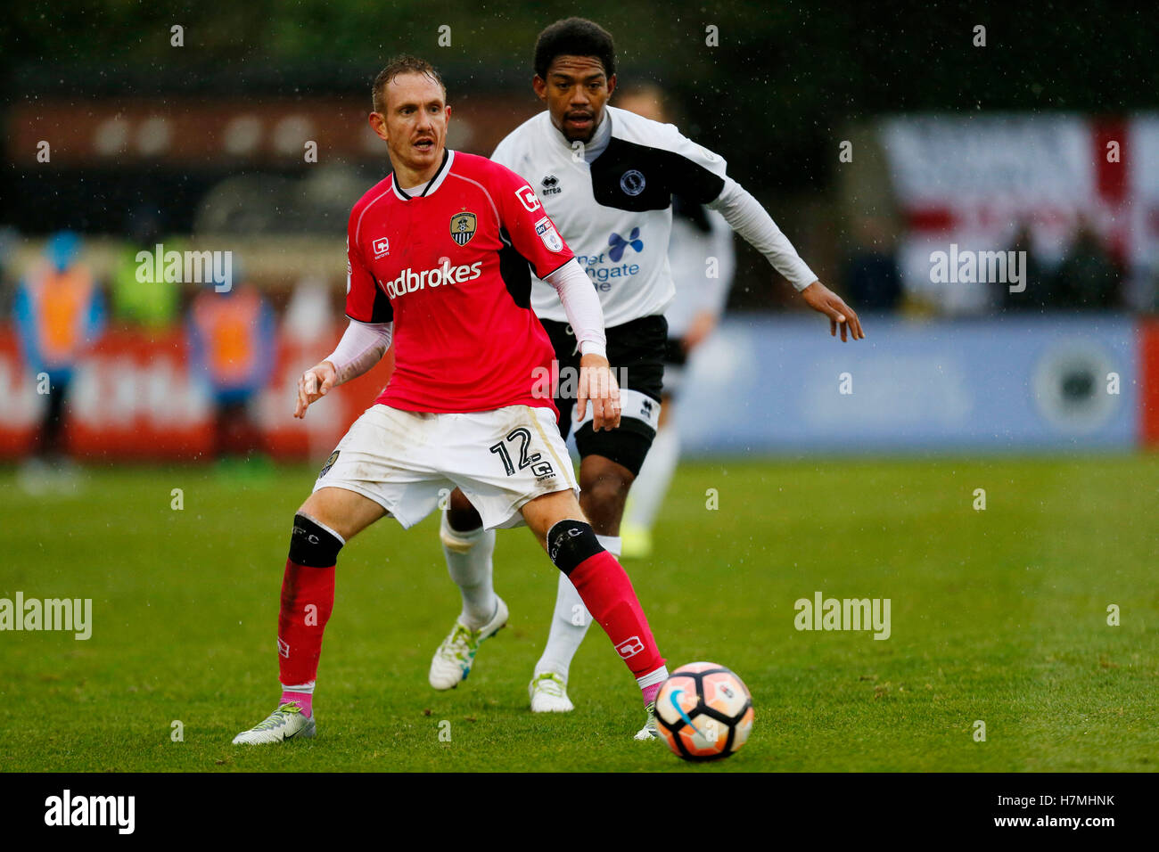 Boreham Wood's Angelo Balantaand Notts County's Rob Milsom battle for ...