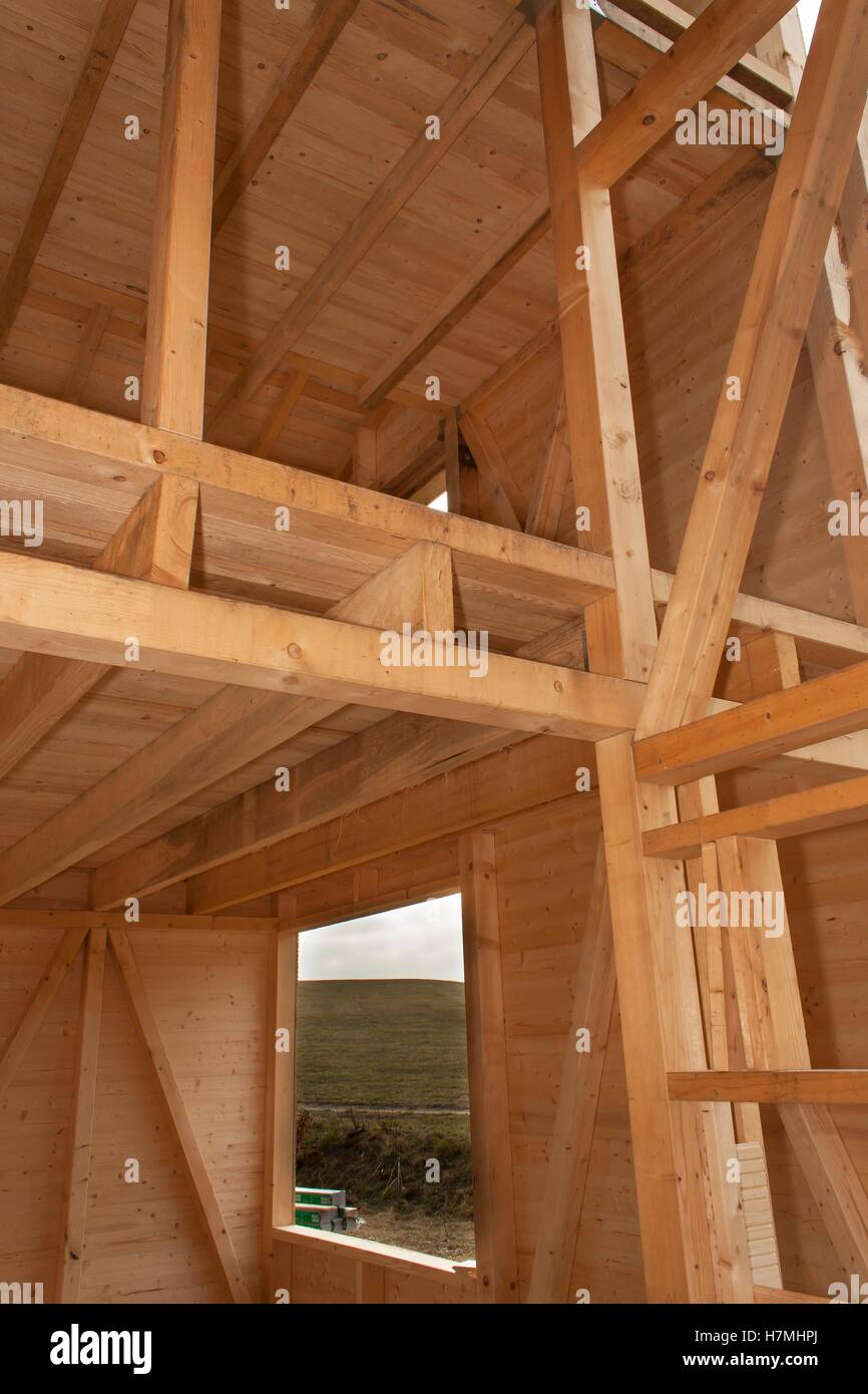 Empty building site ecological house. External work on the building ...