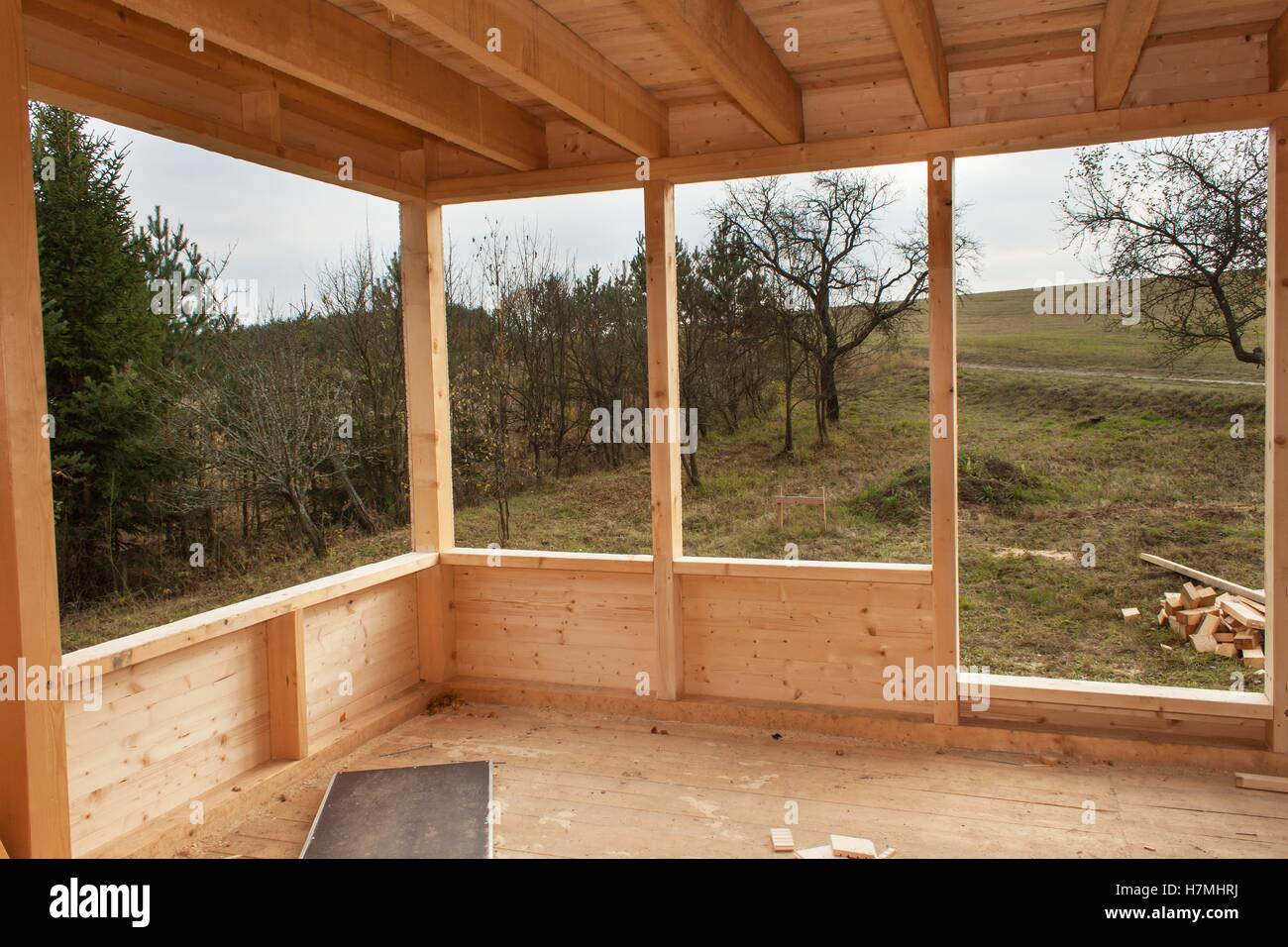Empty building site ecological house. External work on the building ...