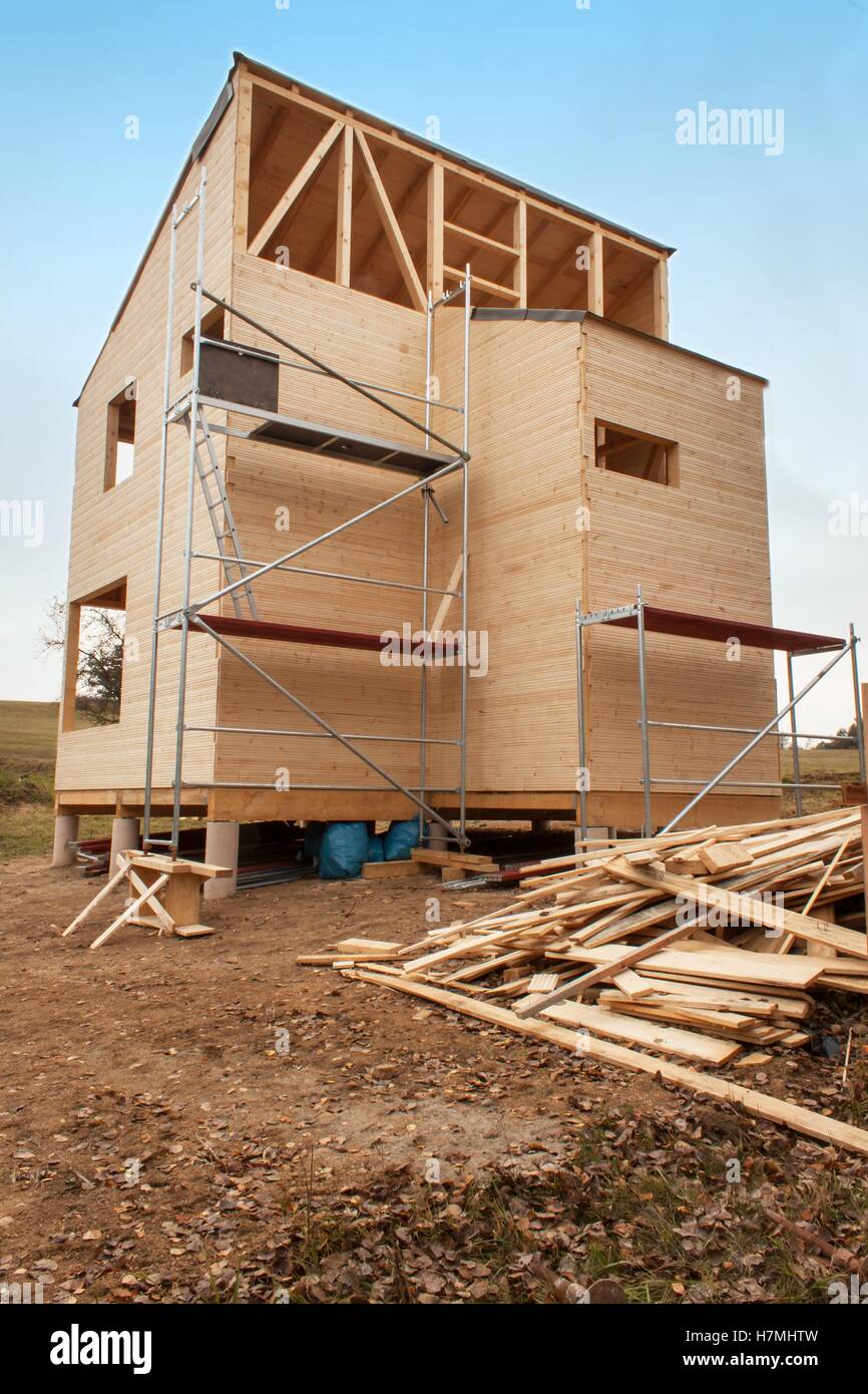 Empty building site ecological house. External work on the building ...