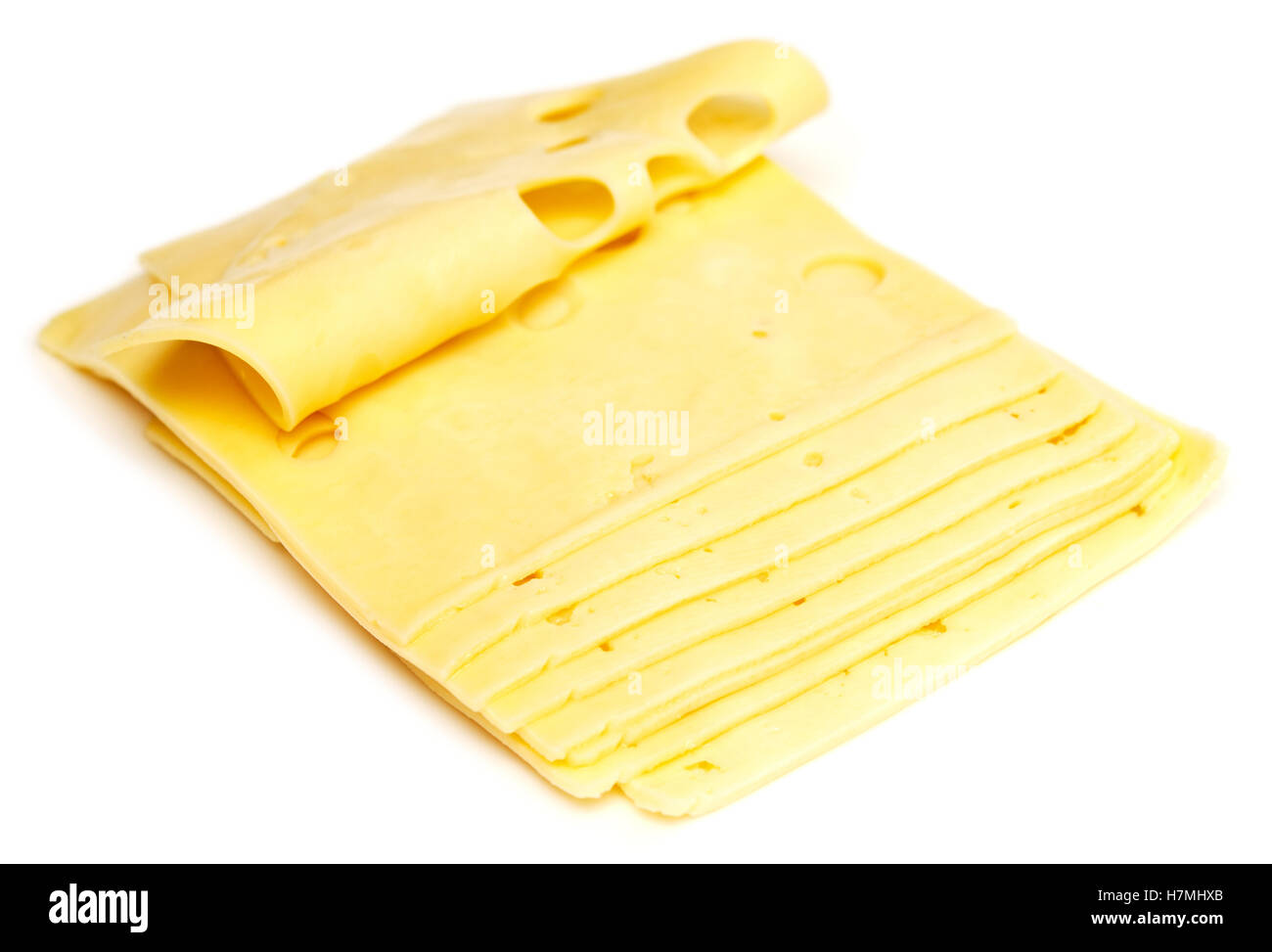 sliced cheese isolated on white background Stock Photo - Alamy