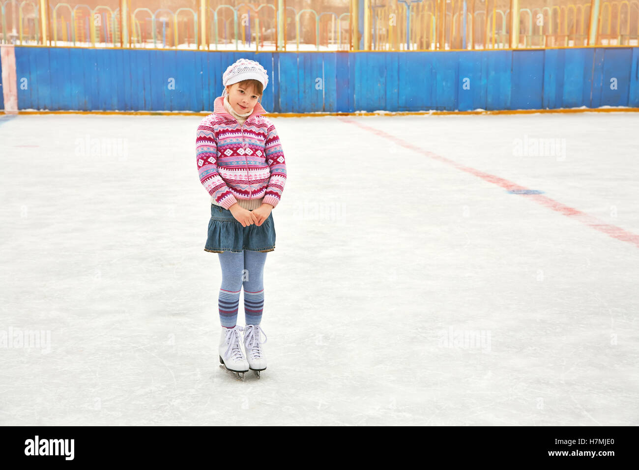 girl ice skating on rink Stock Photo - Alamy
