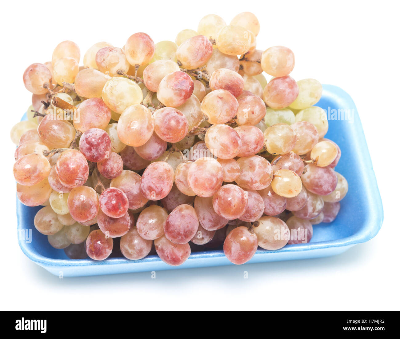 grapes in plastic tray isolated on white background Stock Photo - Alamy