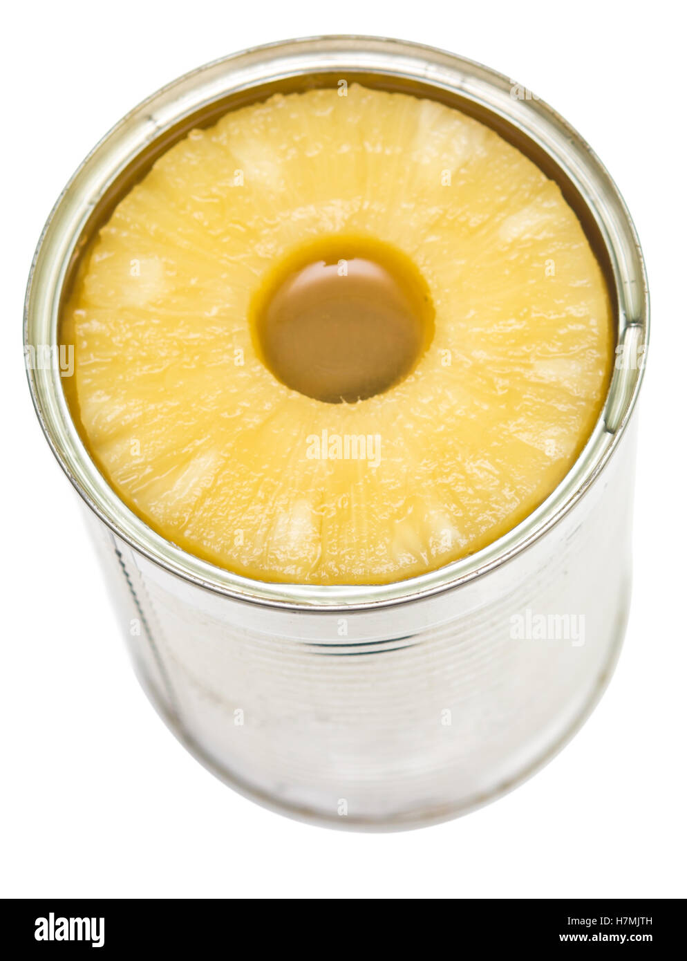 open tin of pineapples isolated on white background Stock Photo - Alamy