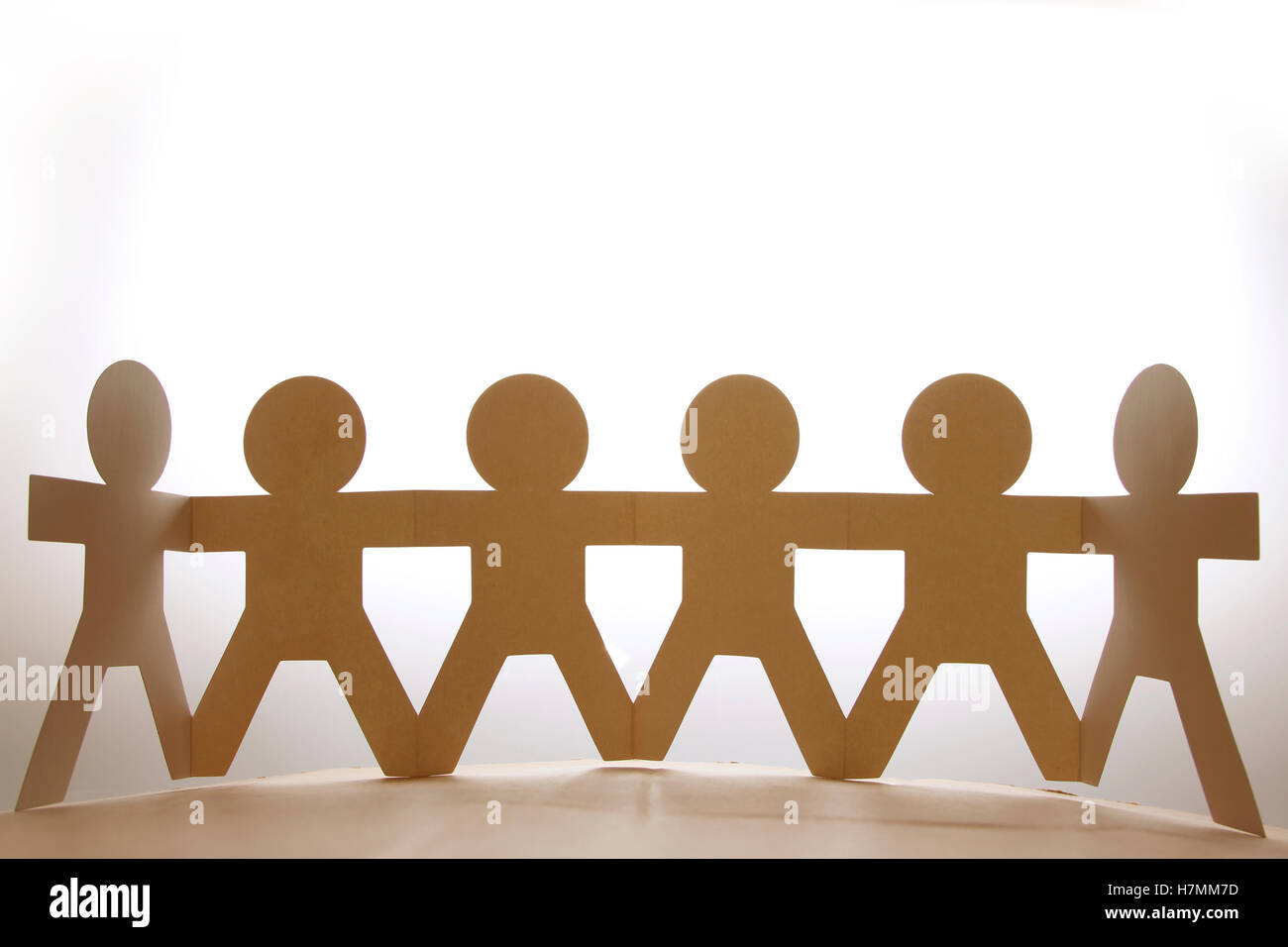 Team of paper doll people Stock Photo - Alamy