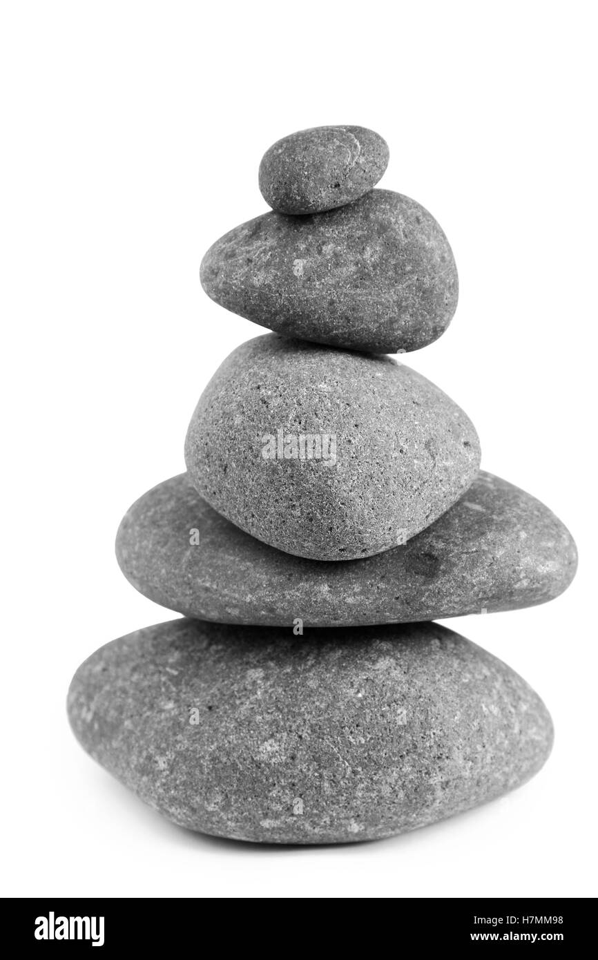 Pile of balanced rocks on plain background Stock Photo - Alamy