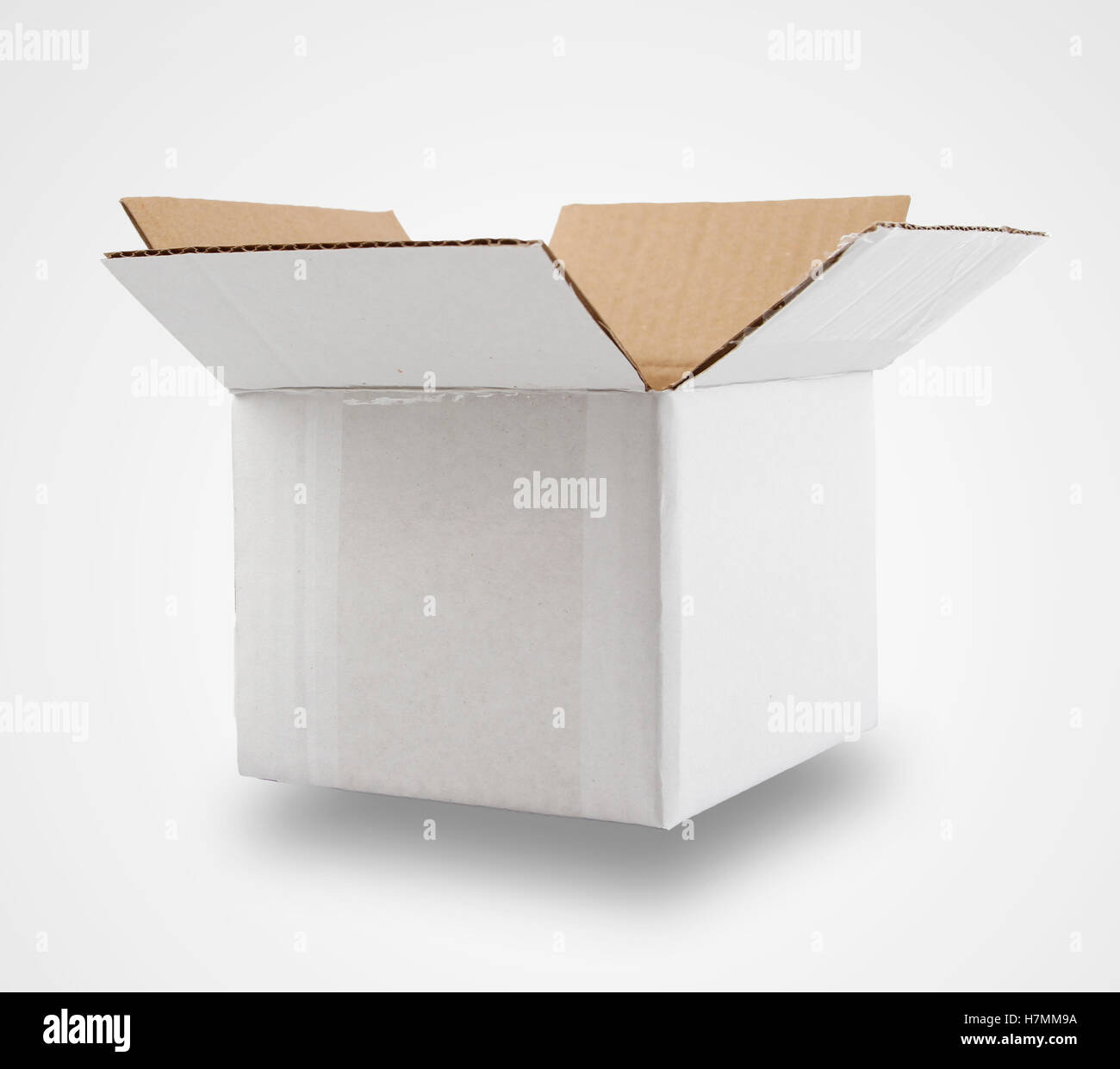 Open cardboard box on plain background Stock Photo - Alamy