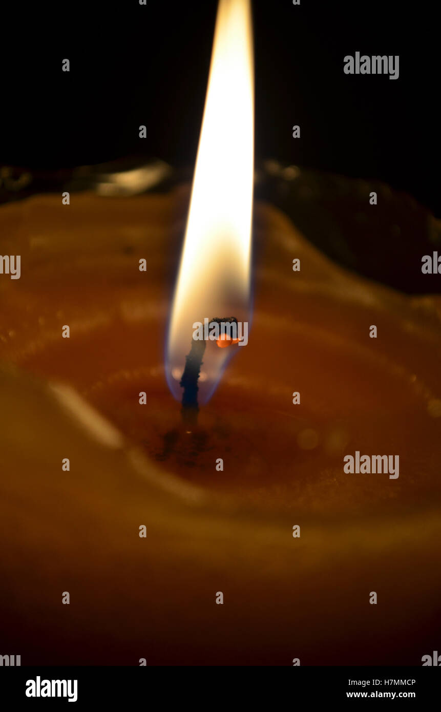 Candle fire on dark hi-res stock photography and images - Alamy