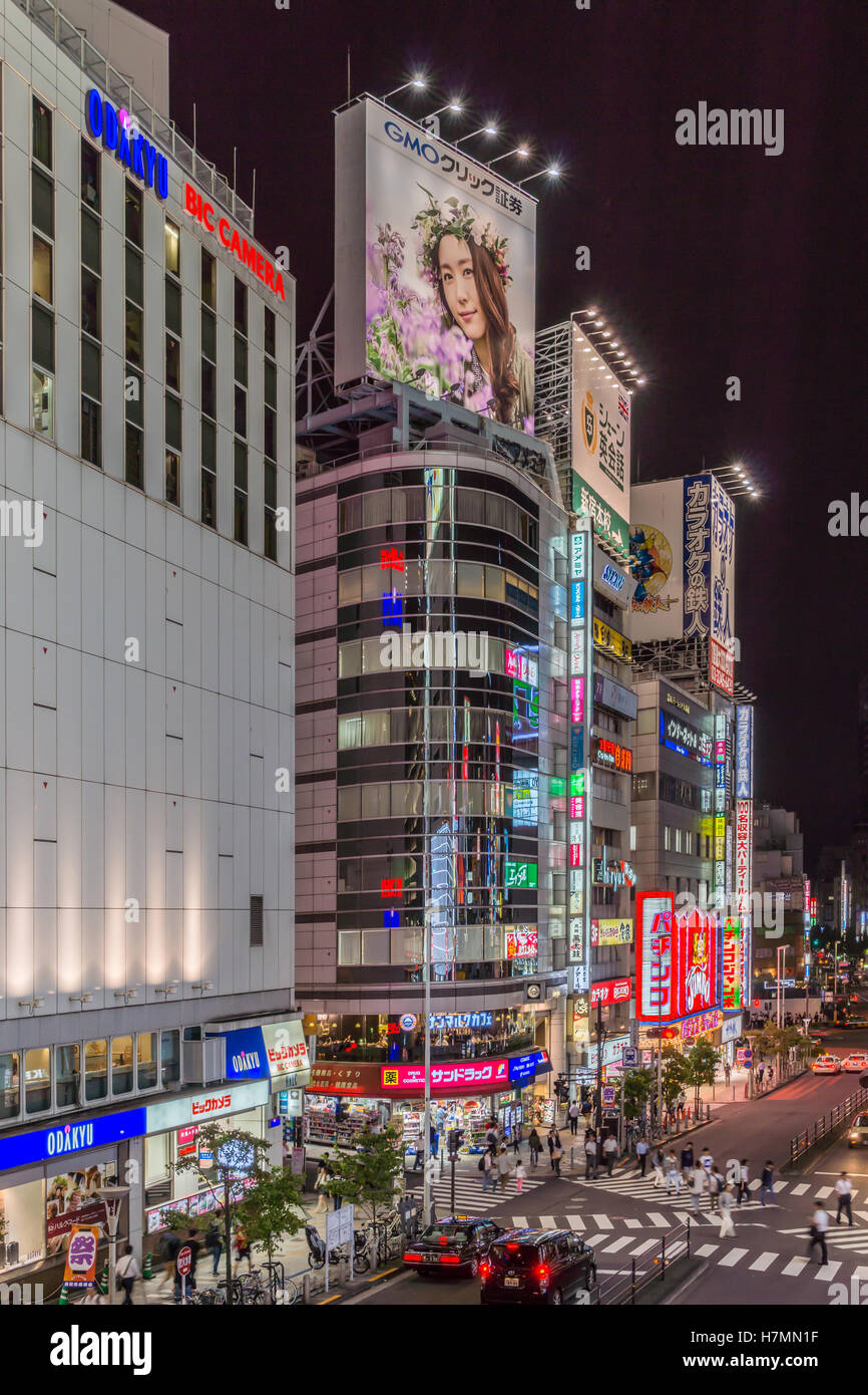 Night photo of shopping street at Shinjuku station Stock Photo - Alamy