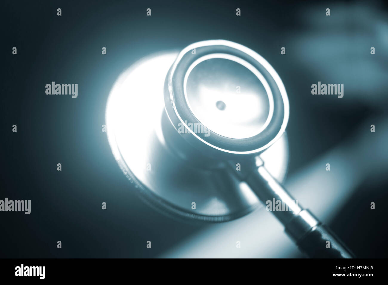 Medical doctor's stethoscope used to listen to patient heart rate ...