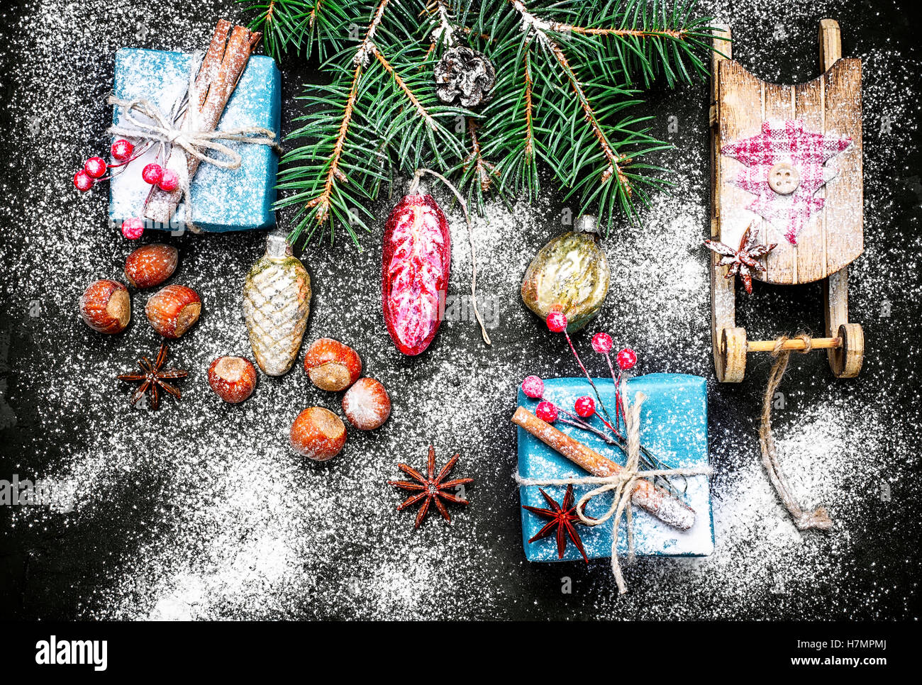 Box with Christmas present and Santa Claus sledge Stock Photo - Alamy