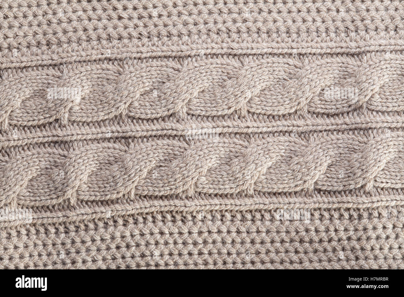 beige knitted sweater background texture close up Stock Photo - Alamy