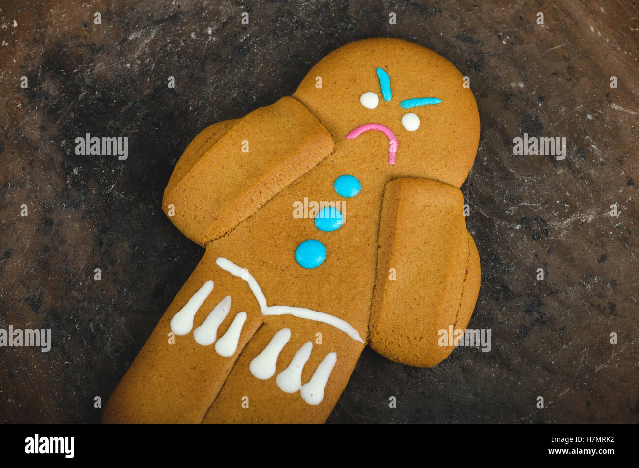Angry gingerbread man cookie on a rustic plate Stock Photo - Alamy