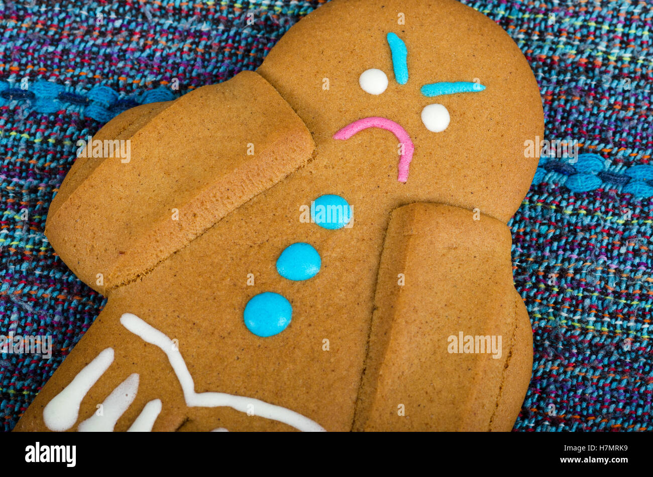 Angry gingerbread man cookie on a table. Close-up Stock Photo - Alamy