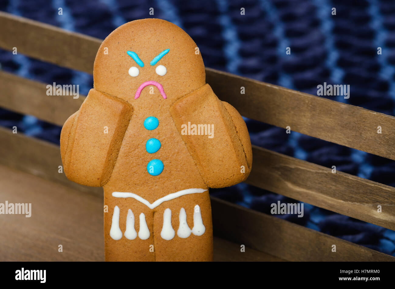 Sad gingerbread man cookie on a bridge Stock Photo - Alamy