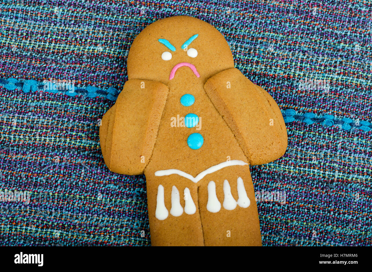 Angry gingerbread man cookie on a table Stock Photo - Alamy