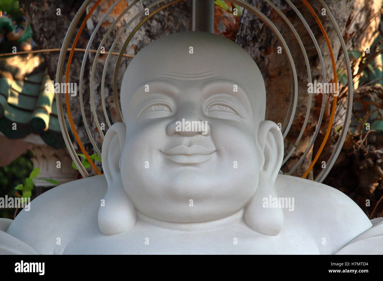 Fat Buddha head Stock Photo - Alamy