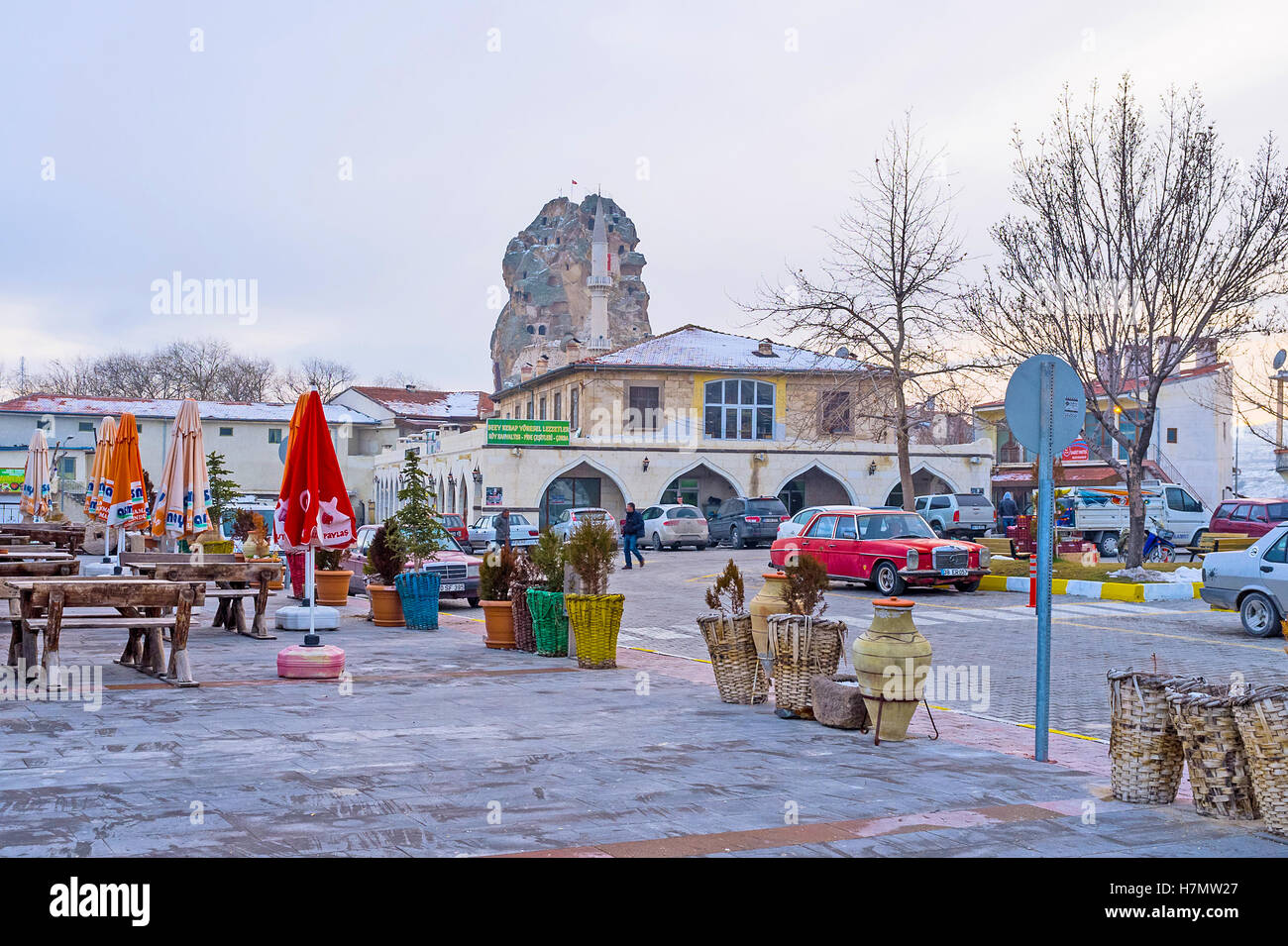 The small mountain resort in Cappadocia boast the high natural rock ...