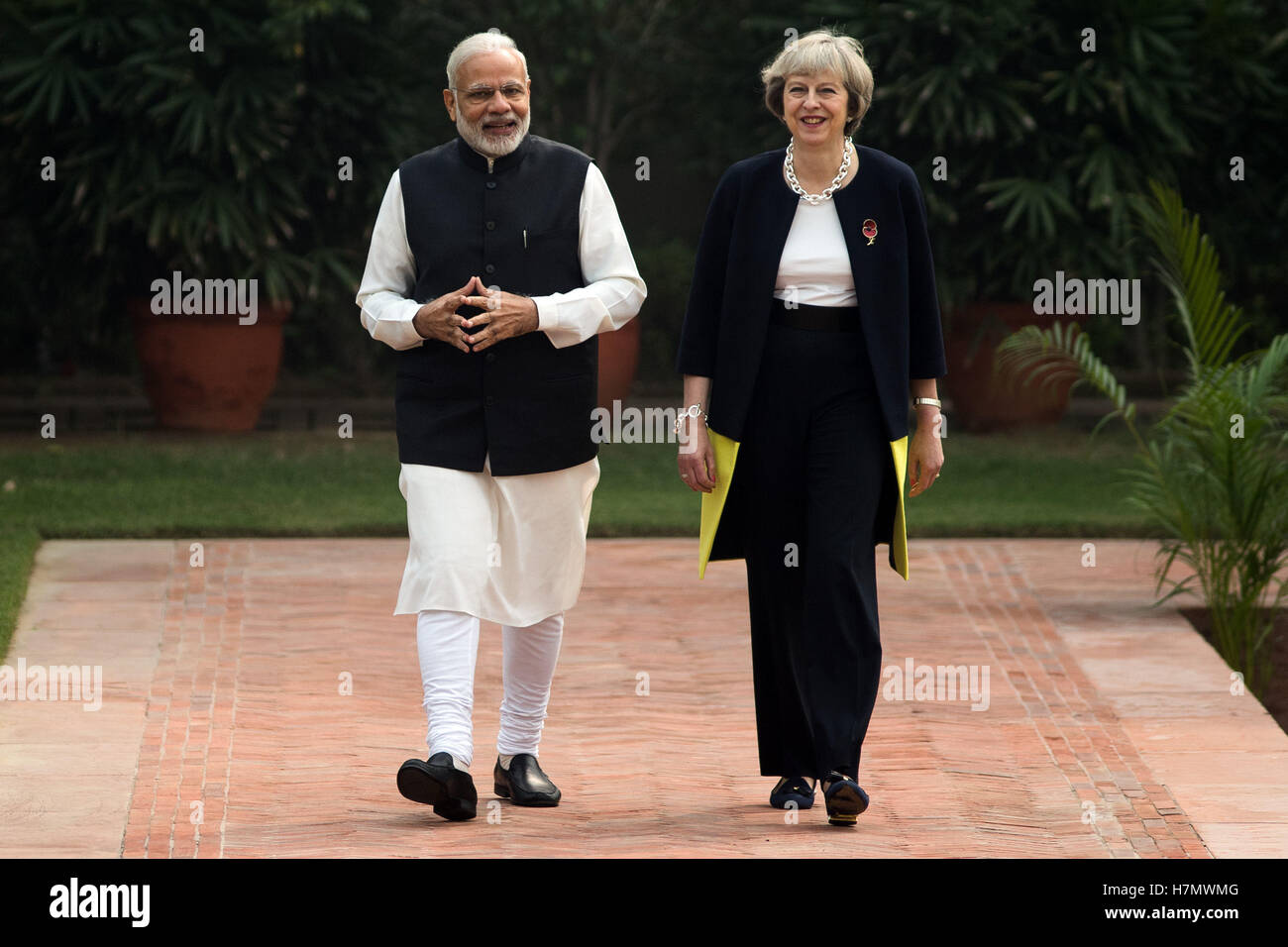 Prime Minister Theresa May and Indian Prime Minister Narendra Modi walk ...