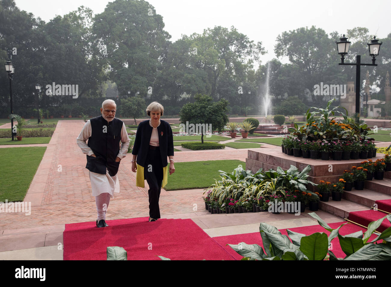 Prime Minister Theresa May and Indian Prime Minister Narendra Modi walk ...