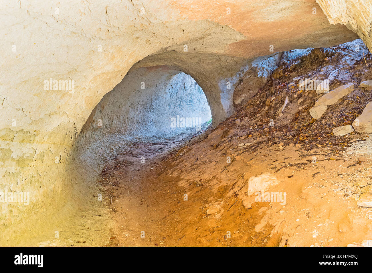 The narrow path through the rock leads to the Rose Valley, the famous ...