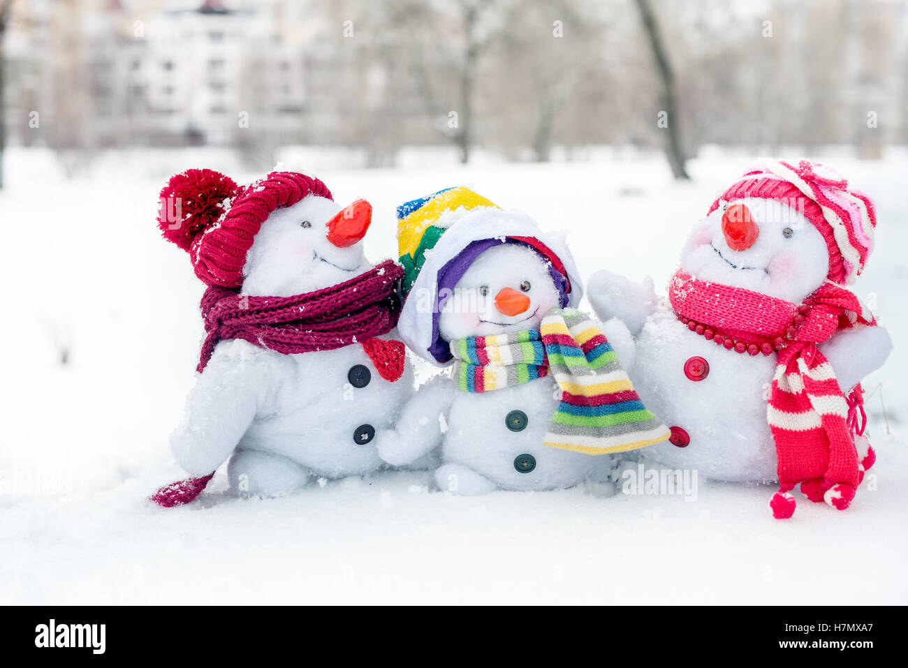 Happy snowman family Stock Photo - Alamy
