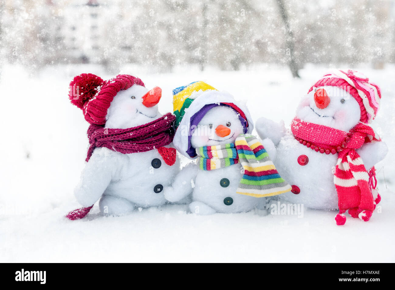 Happy snowman family Stock Photo - Alamy