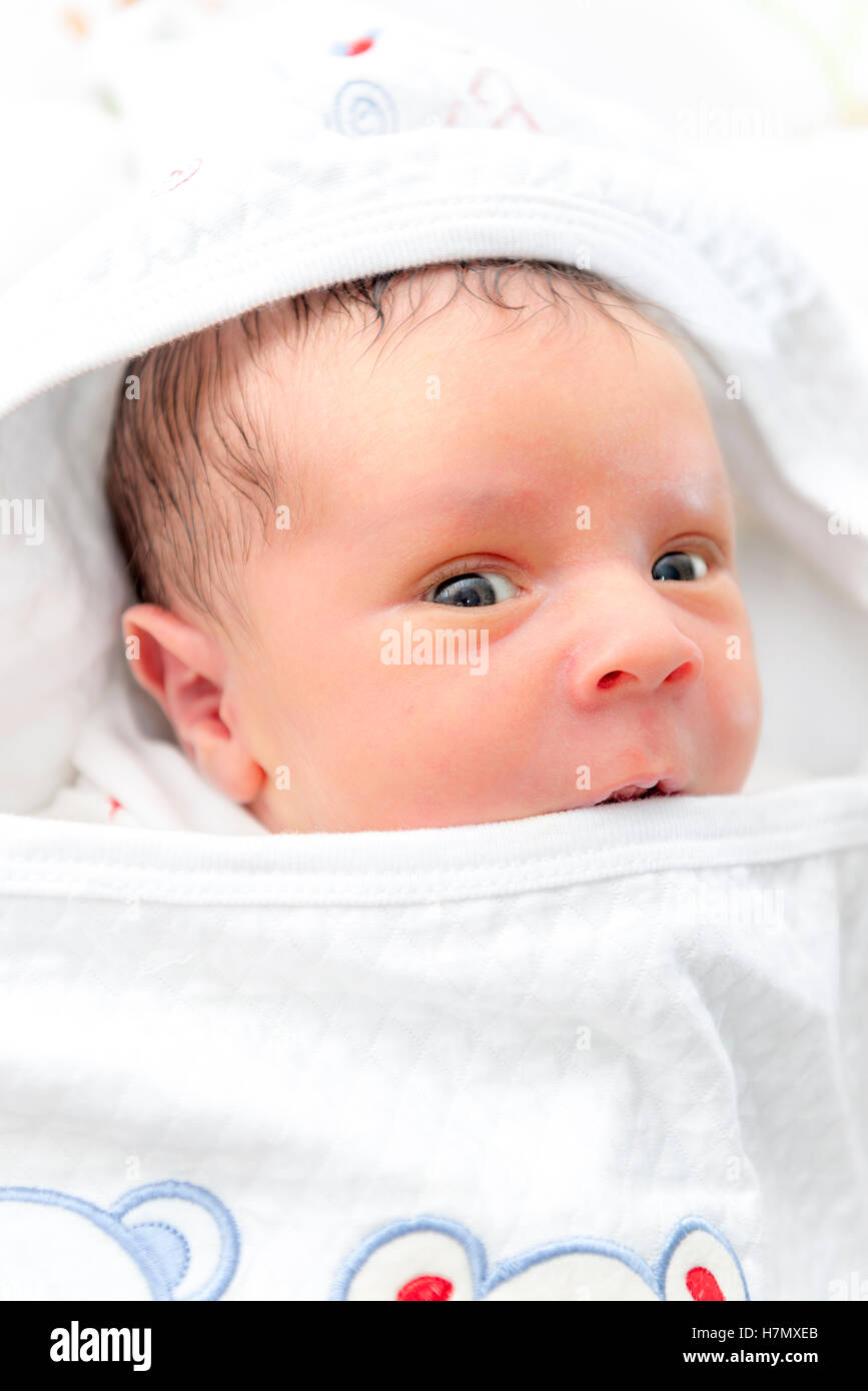Baby boy looking upset hi-res stock photography and images - Alamy