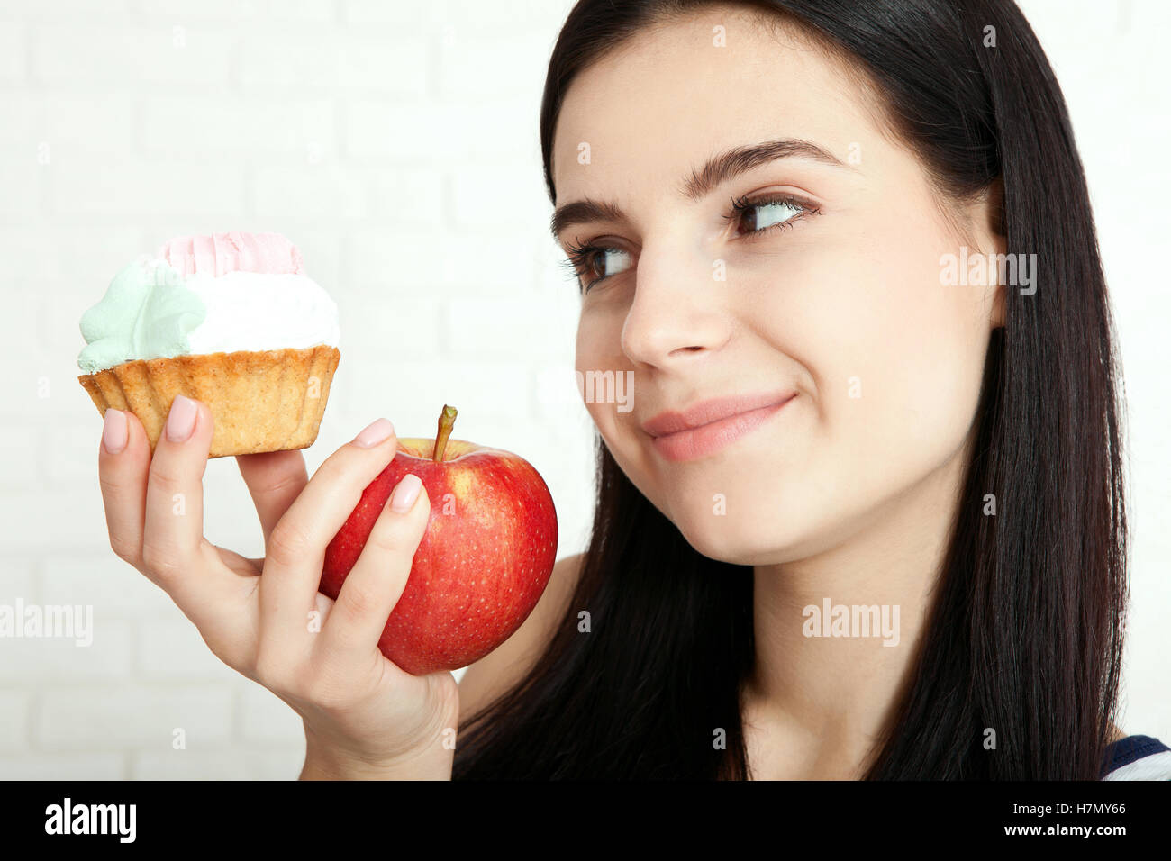 Woman with apple closeup face. Beautiful women exists to clean skin on ...