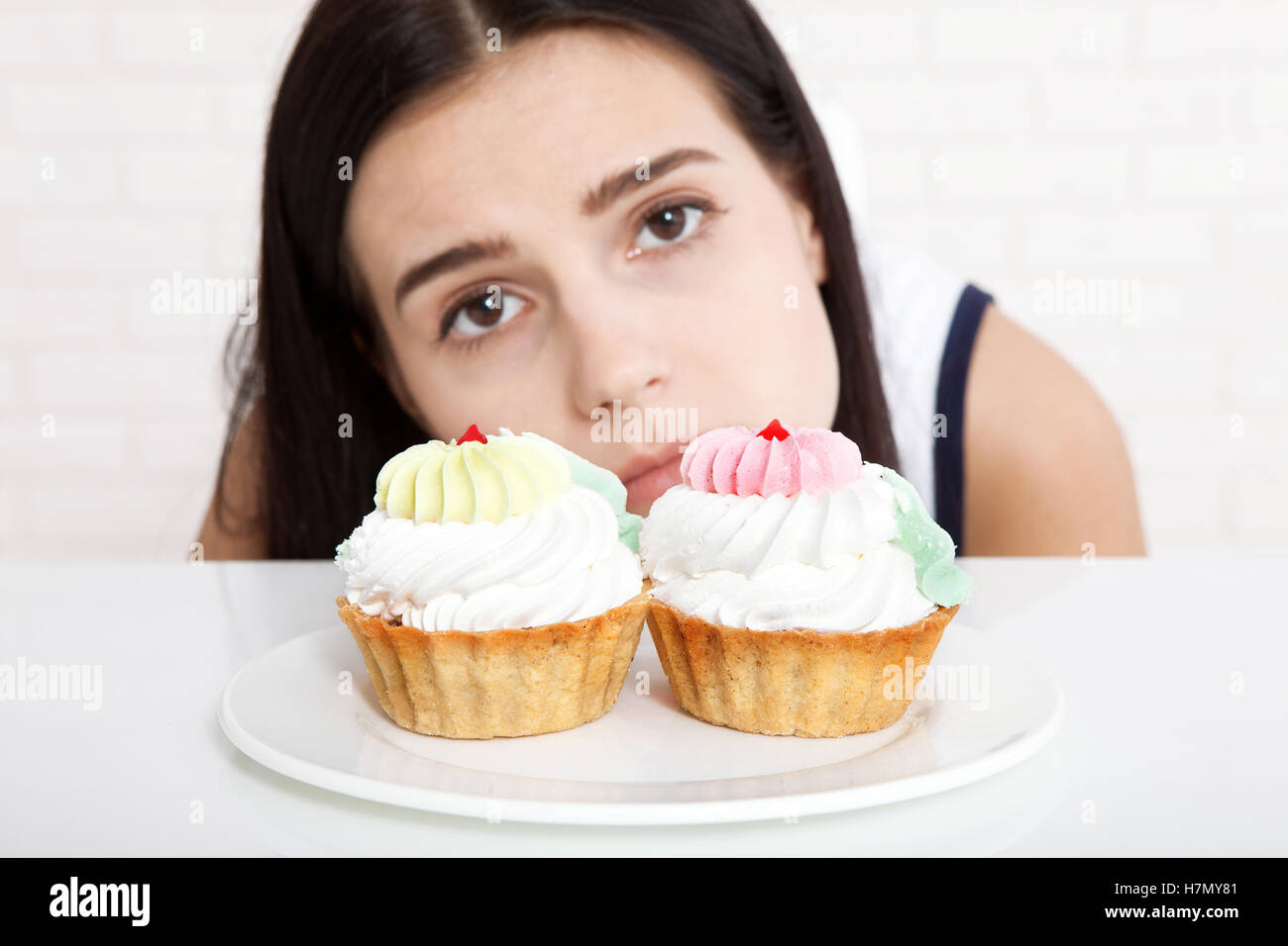 Girl looks at birthday cake hi-res stock photography and images - Alamy