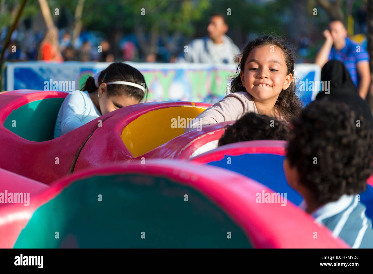 Happy Children Having Fun at Amusement Park Stock Photo - Alamy