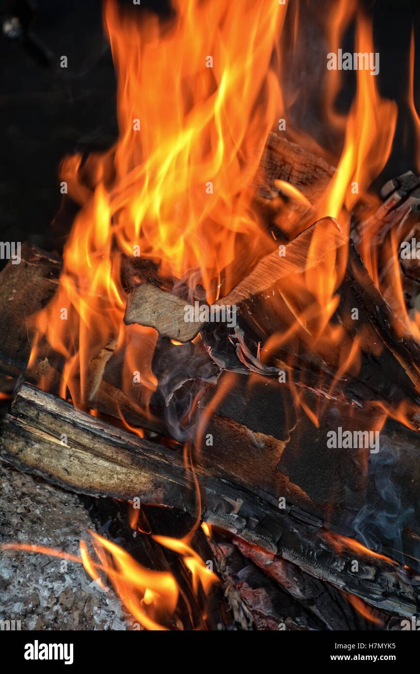 hot flame of fire in darkness Stock Photo - Alamy