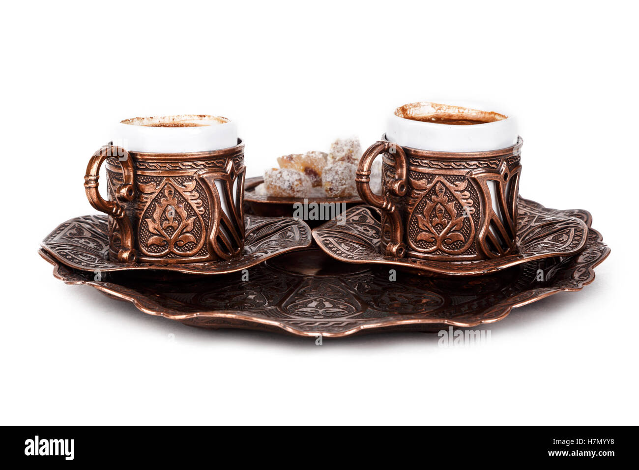 Traditional cup of Turkish coffee with foam and Turkish delights ...