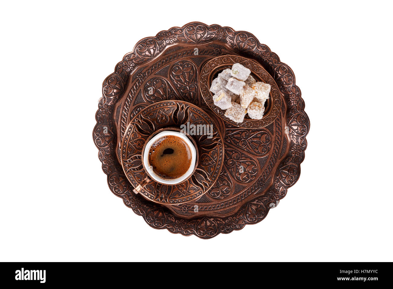 Traditional cup of Turkish coffee with foam and Turkish delights, top ...