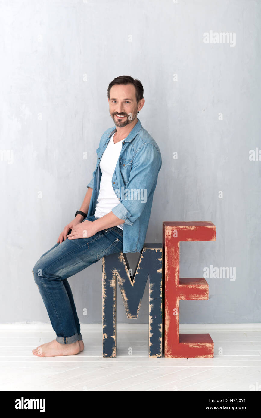 Good looking happy man laughing Stock Photo - Alamy