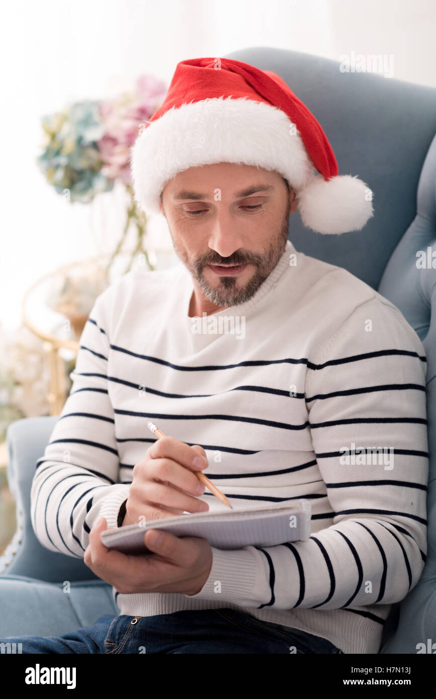 Concentrated man making notes hi-res stock photography and images - Alamy