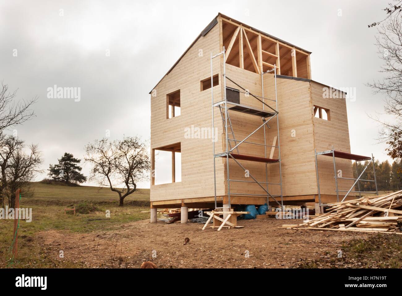 Empty building site ecological house. External work on the building ...