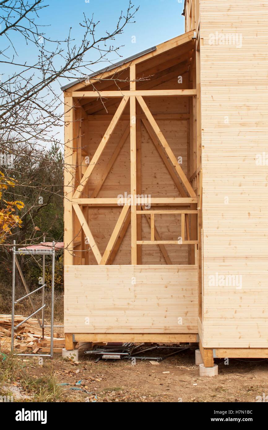Empty building site ecological house. External work on the building ...