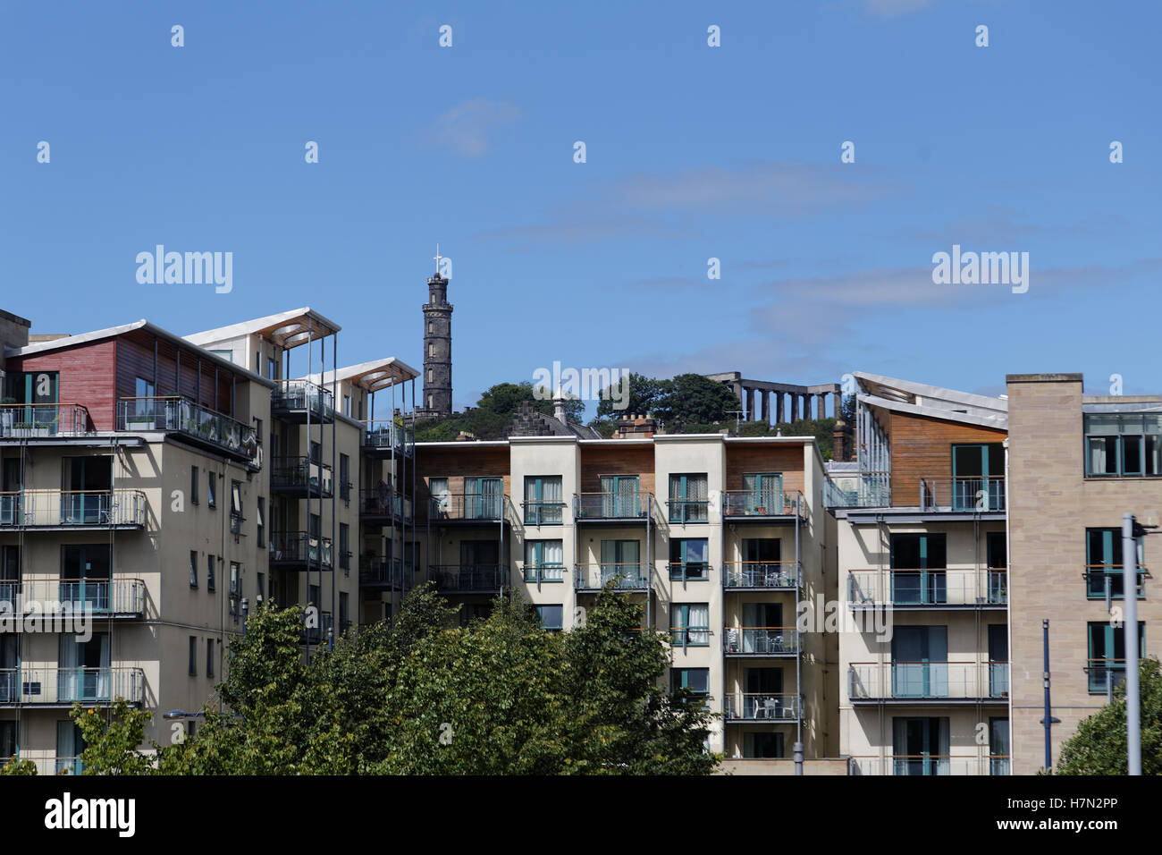 Contrast of modern flats with calton hill Edinburgh, Scotland, UK Stock ...