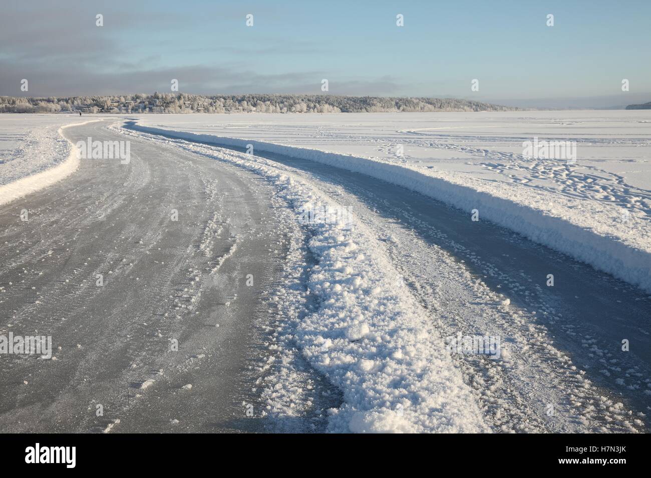 Frozen lake path Stock Photo - Alamy